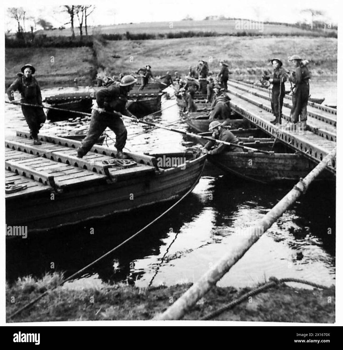 BRIDGE BUILDING DEMONSTRATION - R.Es. building abridge of folding boats ...