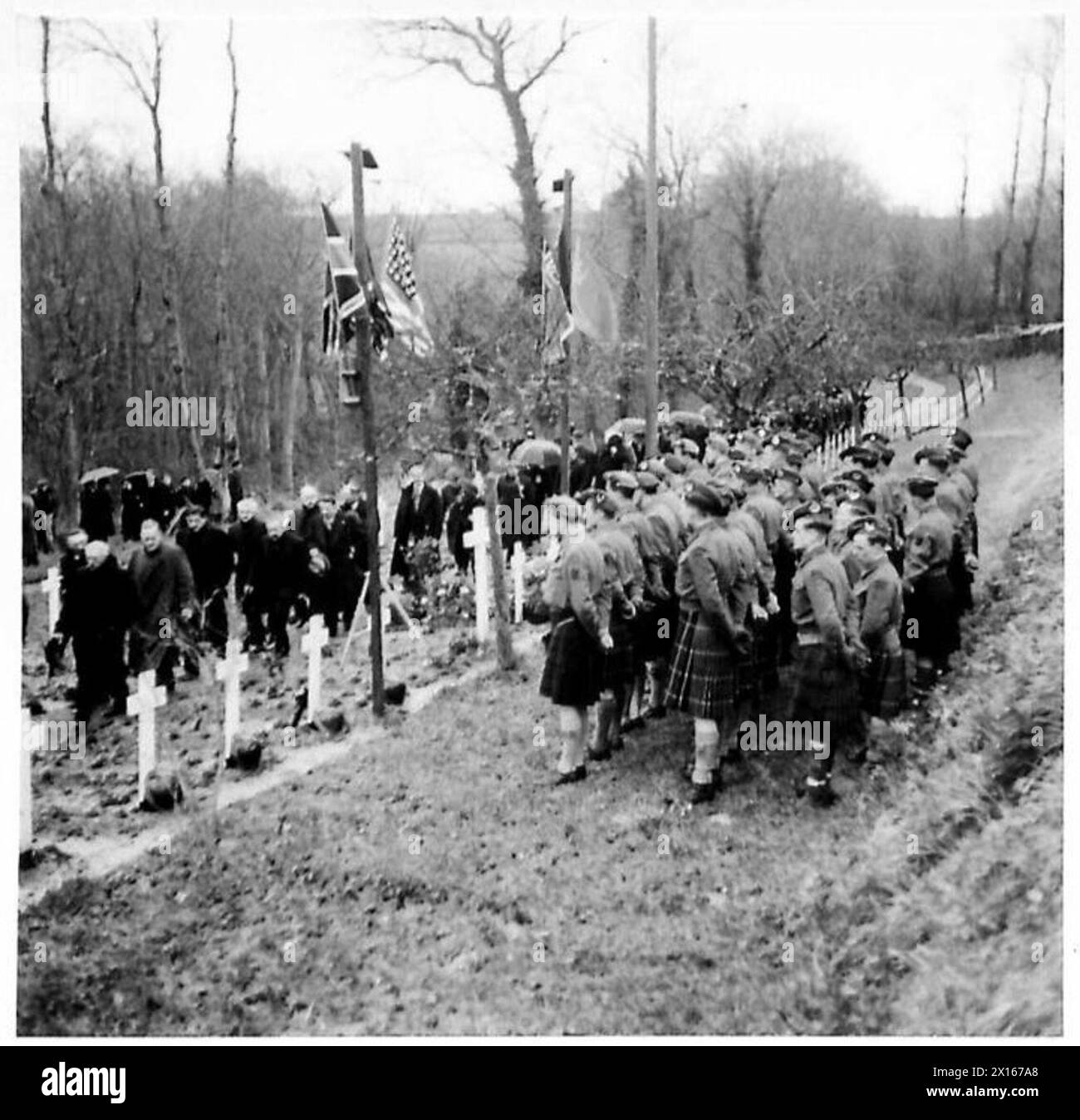 Troops of the 51st Highland Division attend a military cemetery in St ...