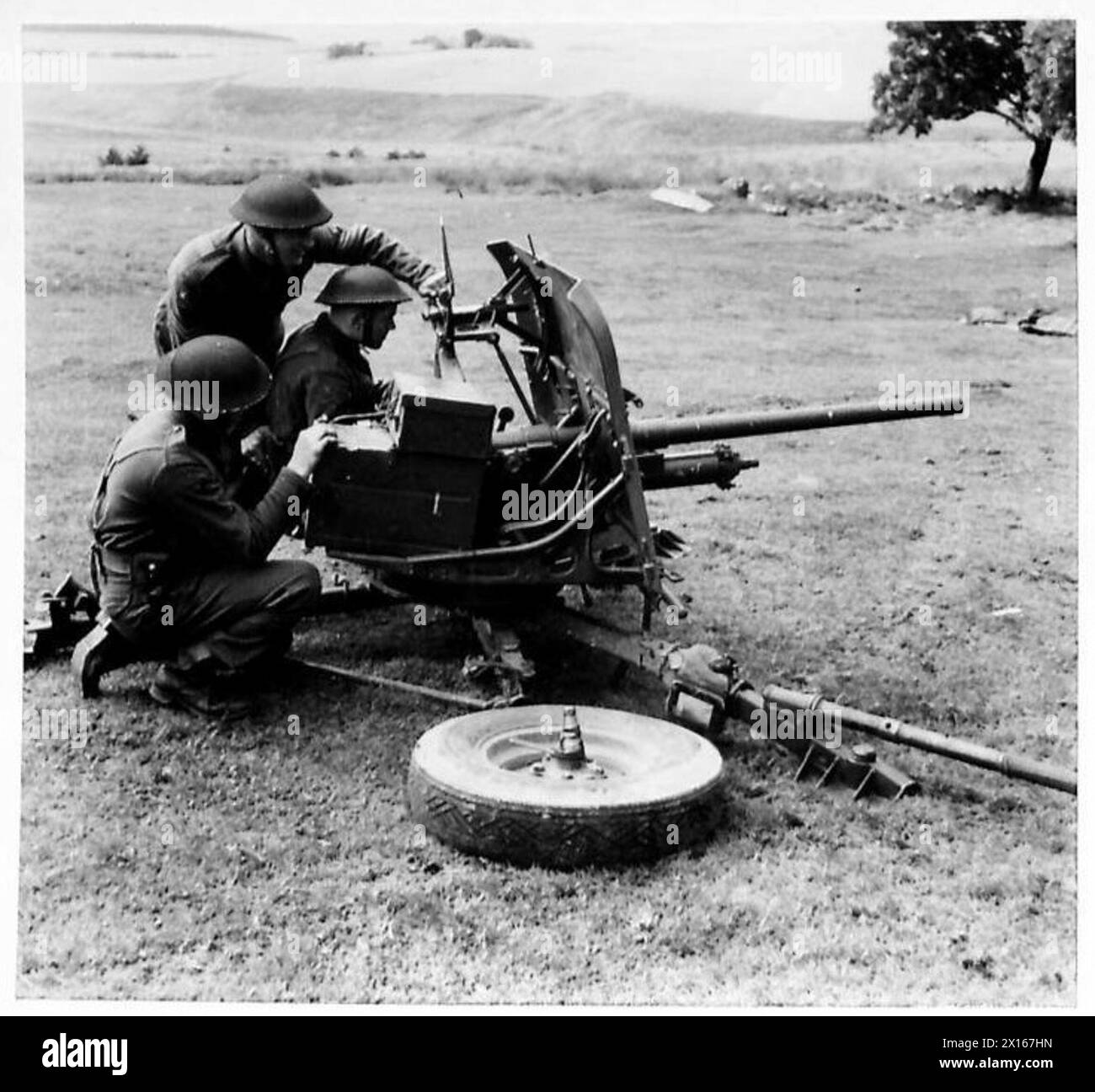 THE 2-PDR. ANTI-TANK GUN (MARK III) - Side view of the gun , British ...