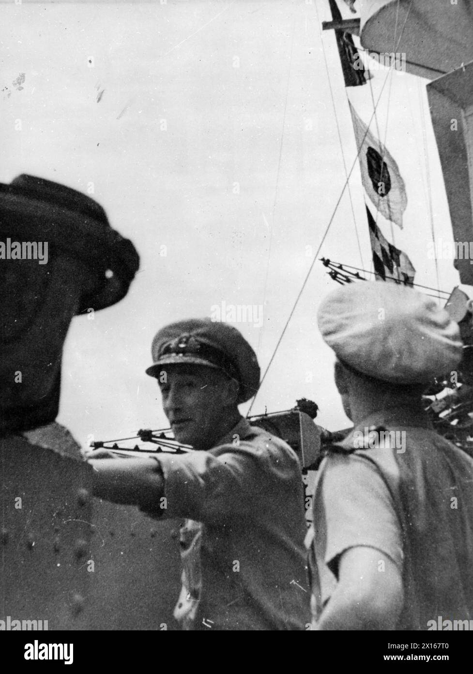HMS King George V displays a cease-fire signal off the Japanese coast ...