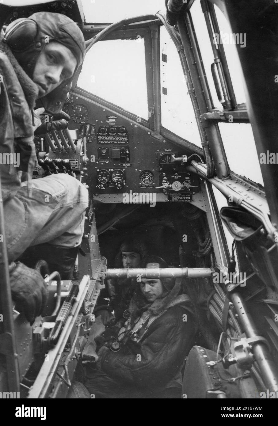 RAF BOMBER COMMAND - The pilot, navigator and bomb aimer at their ...