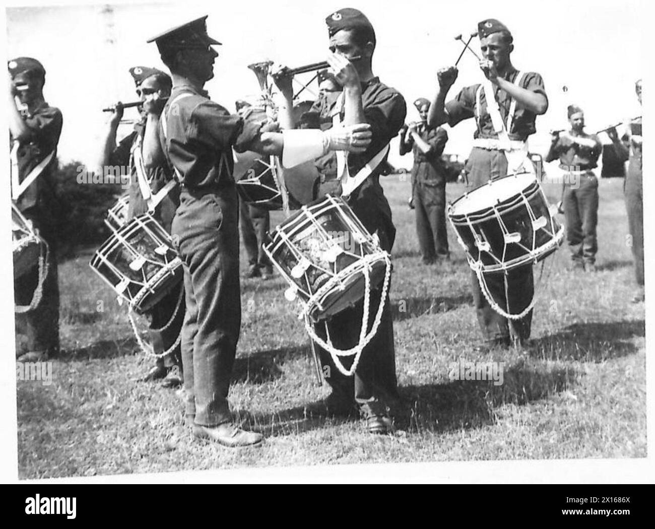 The Drum-Major provides advice while Royal Engineers construct a ...