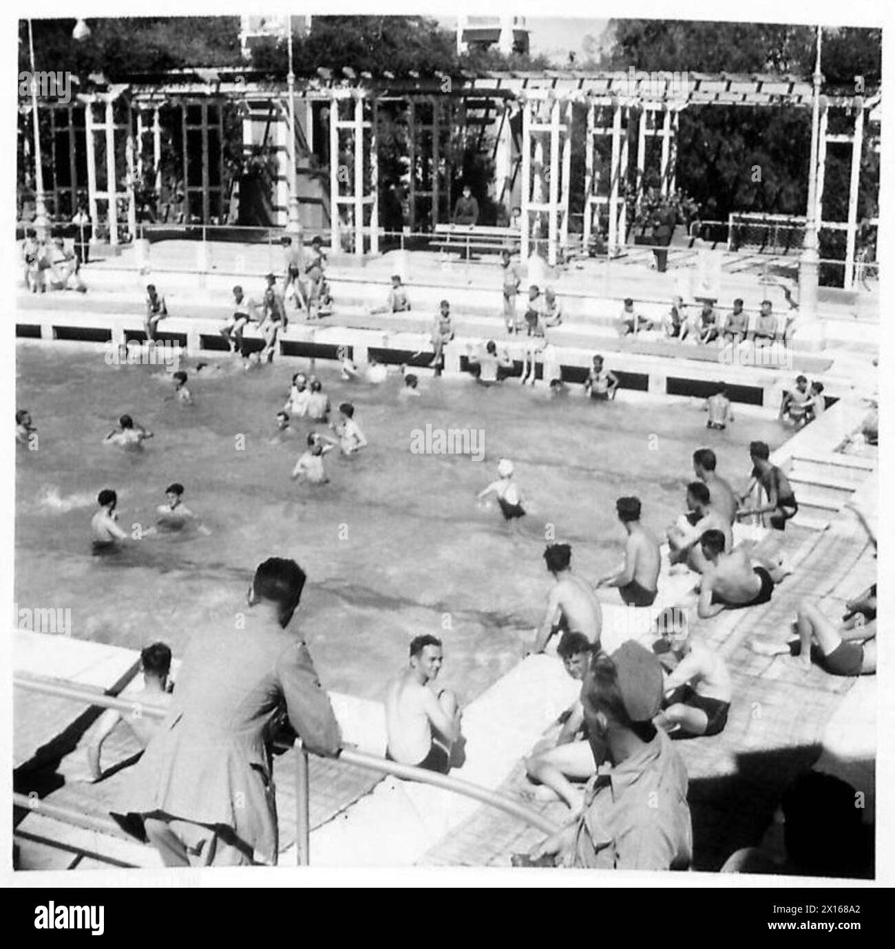 British troops of the First Army relax and swim in a modern swimming ...