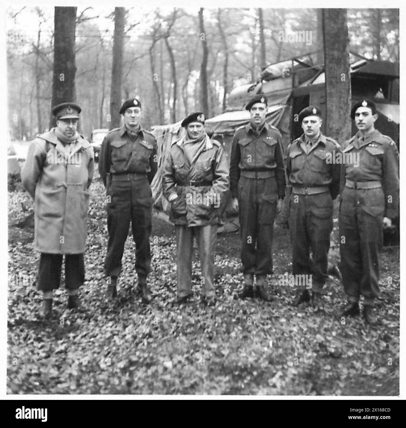 Recipients are photographed with the Commander-in-Chief, General Crerar ...