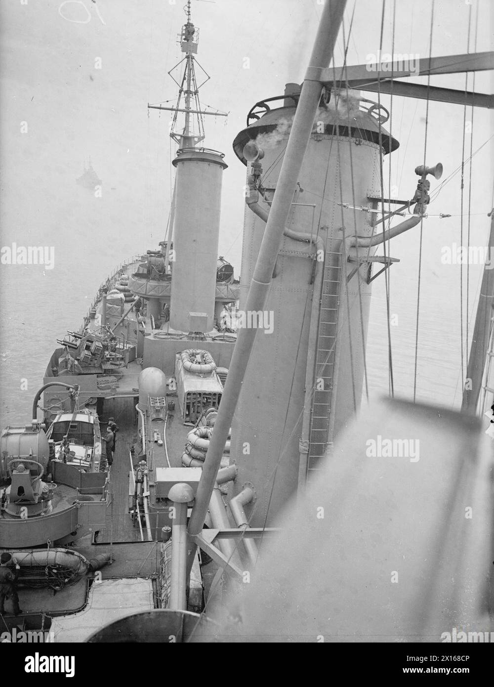The starboard waist of the Dido-class light cruiser HMS Bonaventure is ...
