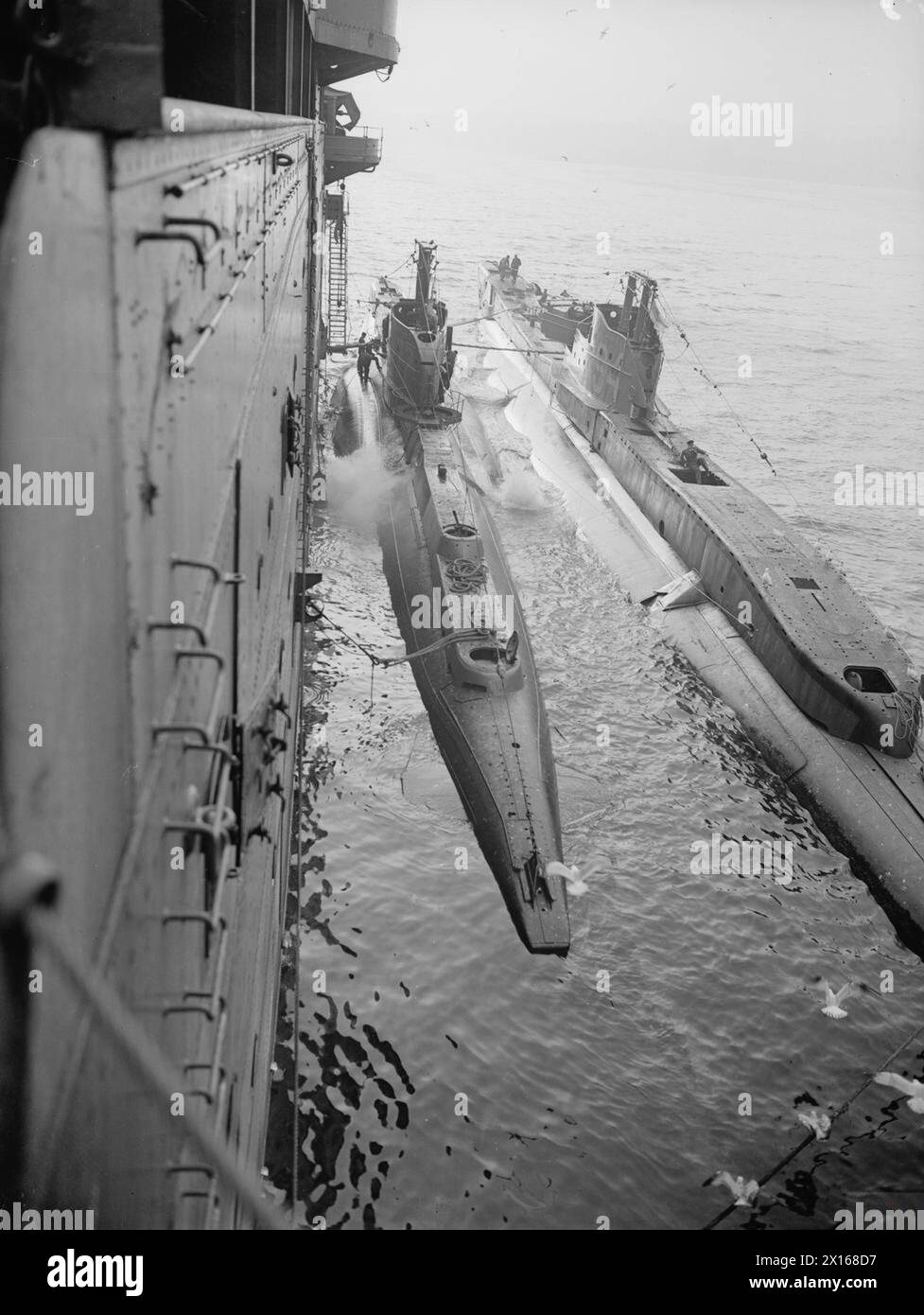 WITH THE ROYAL NAVAL SUBMARINERS AT HMS FORTH, THE SUBMARINE DEPOT SHIP ...