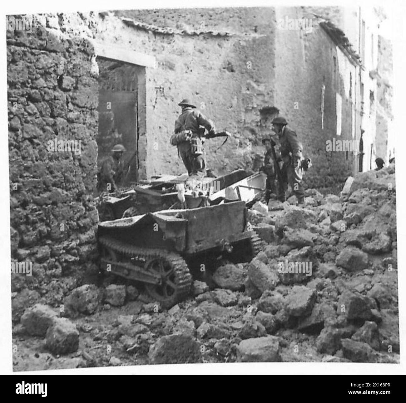 EIGHTH ARMY : THE FALL OF AQUINO - Infantrymen move warily past a ...
