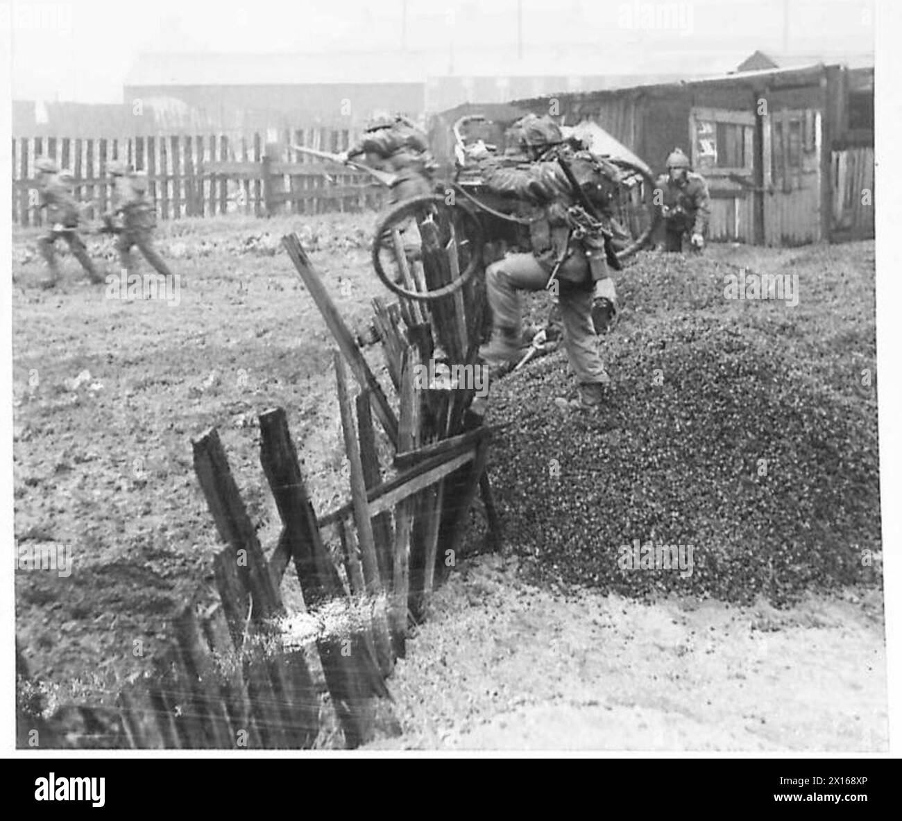 Airborne troops participate in an attack exercise against Home Guard ...