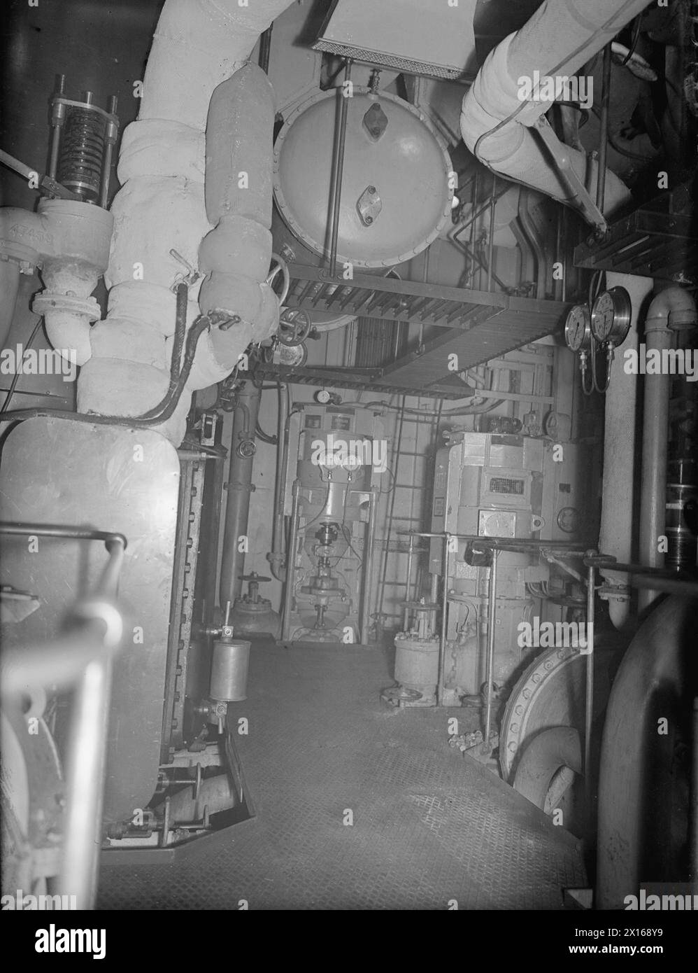 The forward auxiliary machinery compartment of HMS Indefatigable at ...