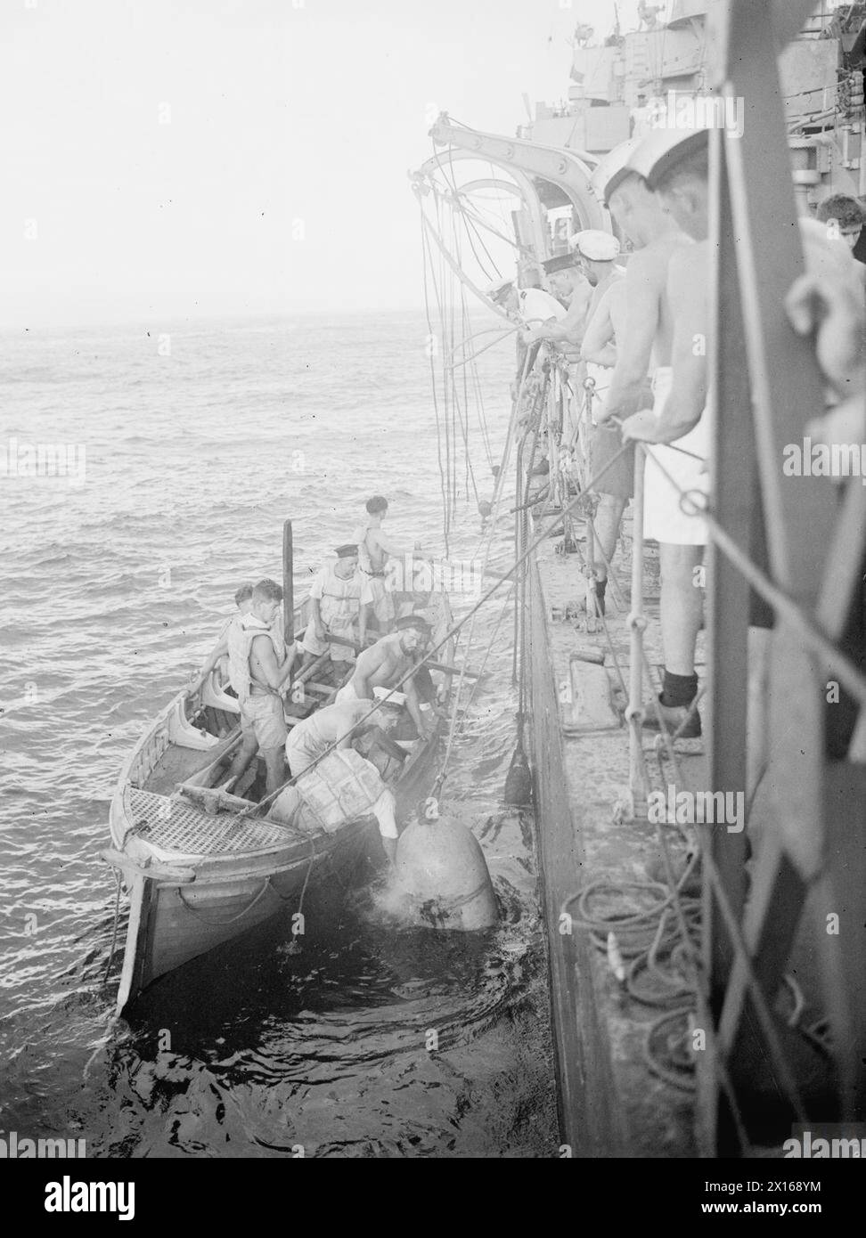 HMS Derwent, a British destroyer, conducted a torpedo exercise and ...