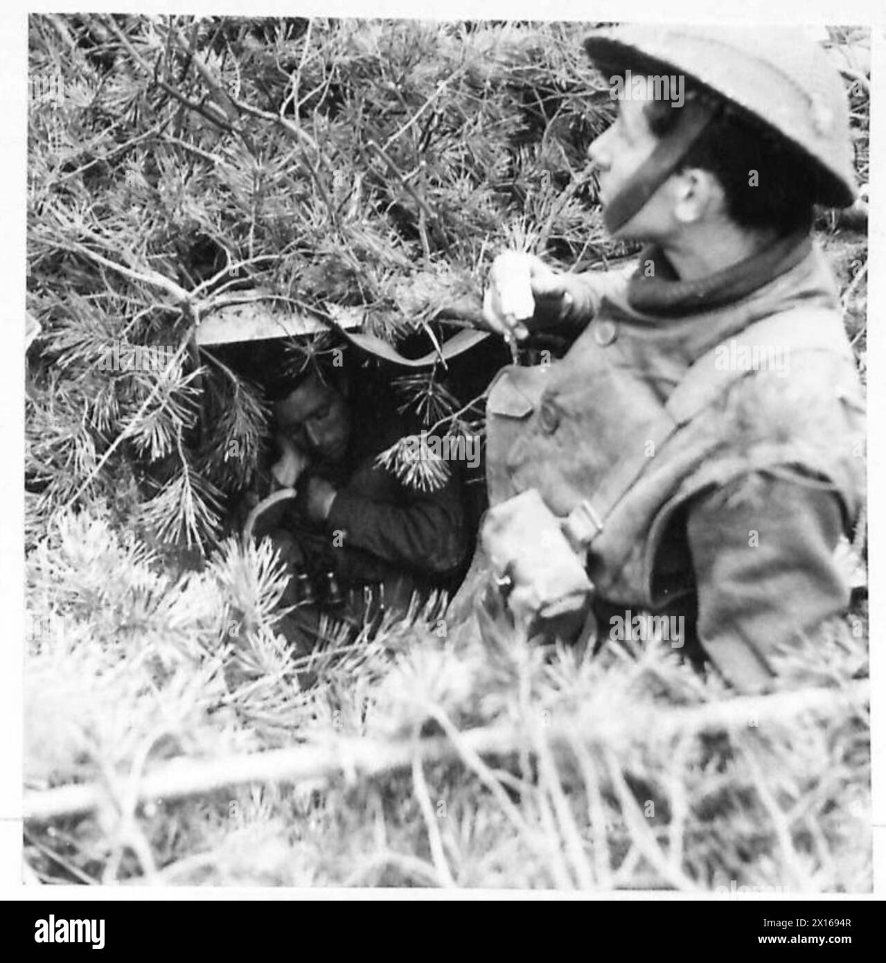 Privates Carter and Harker, of Somerset and Belfast respectively, rest ...