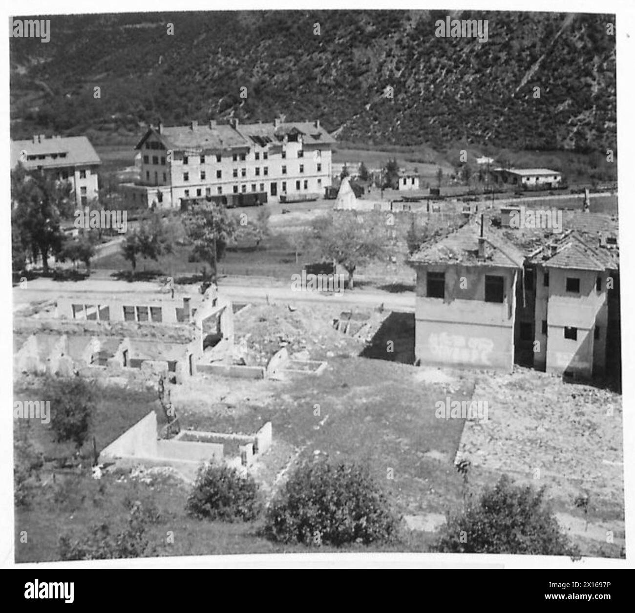 The Bosnian village of Drvar shows damaged houses with a railway ...