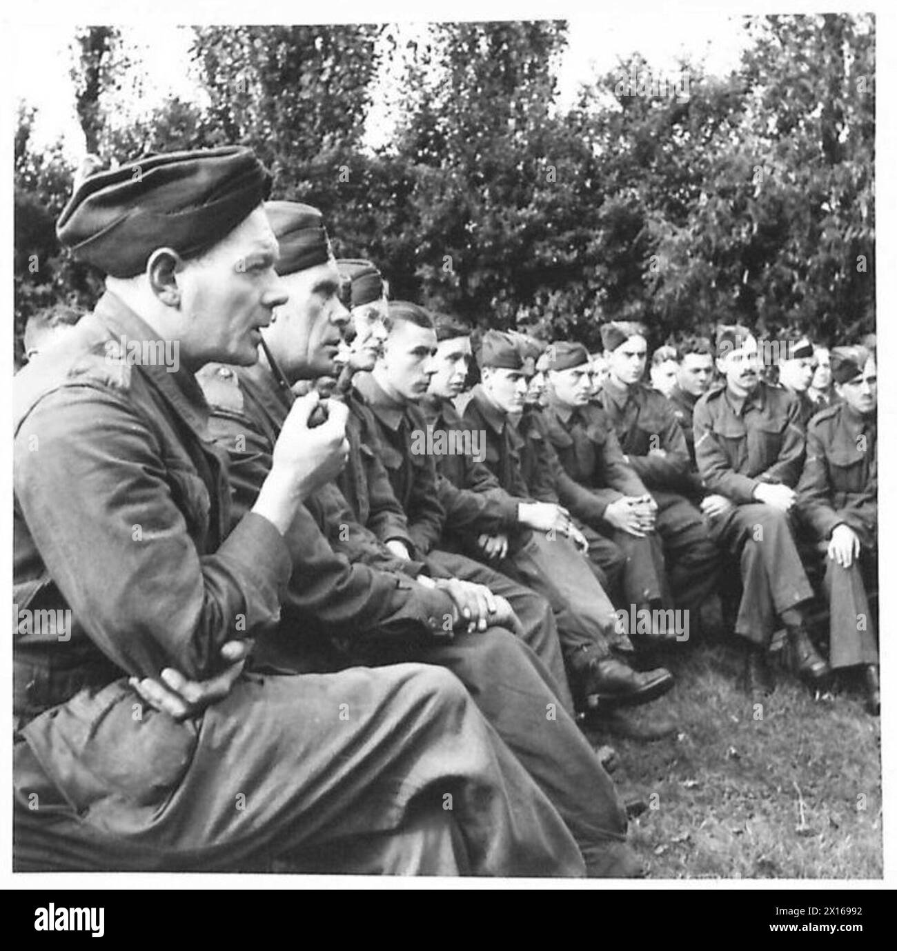 Soldiers attend a discussion led by an officer based on the weekly Army ...