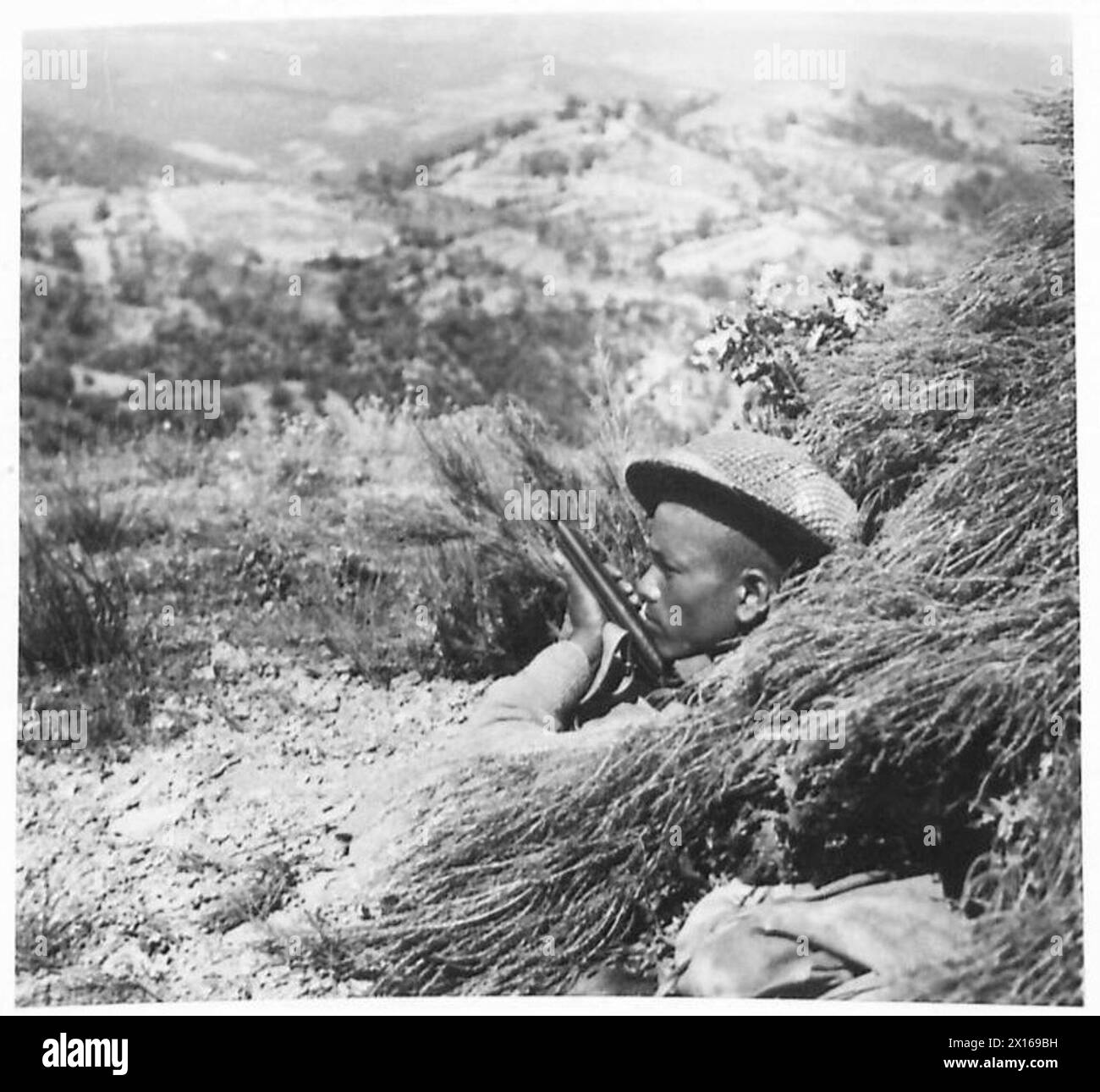 Gurkha soldiers of the Eighth Army fortified a trench strongpoint on ...