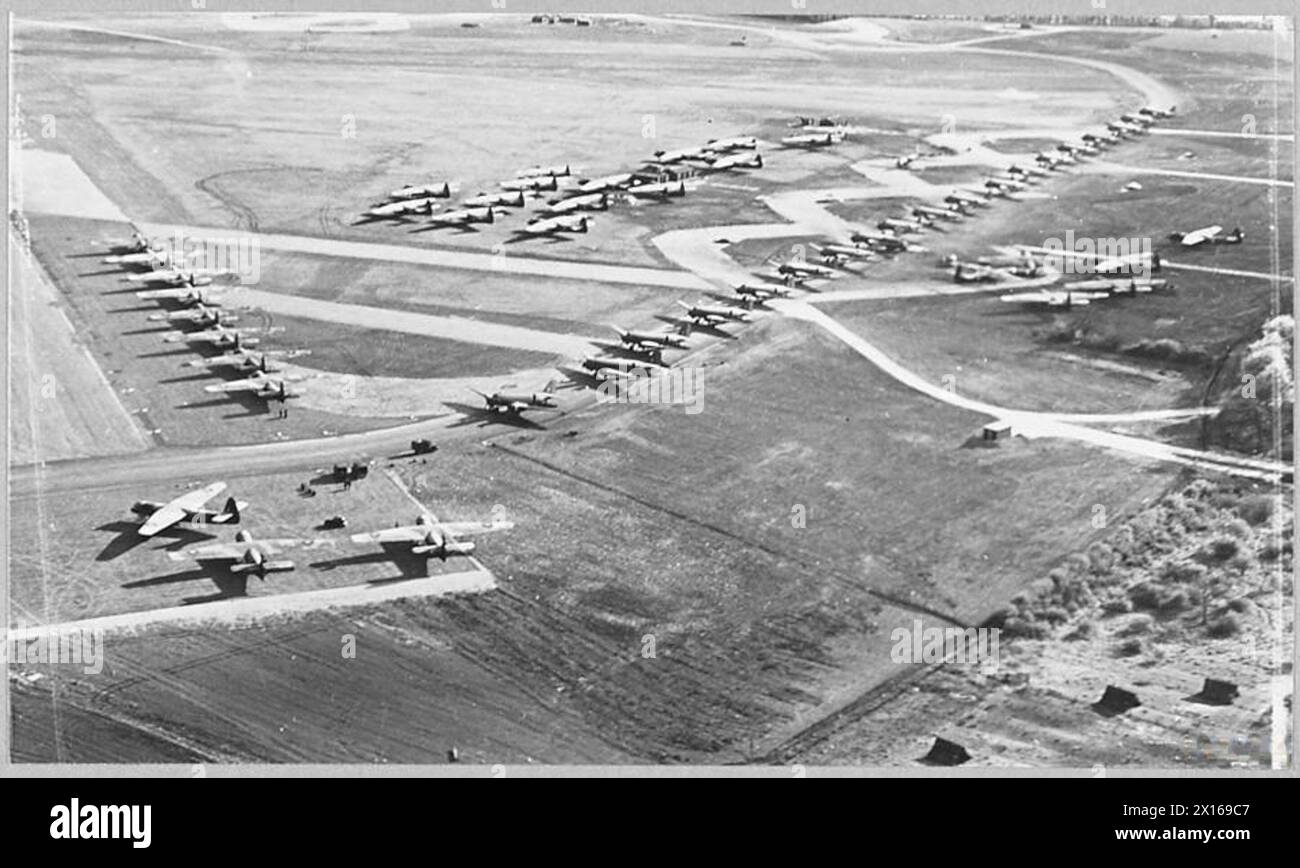 RAF Horsa gliders and tug aircraft are positioned for takeoff during ...