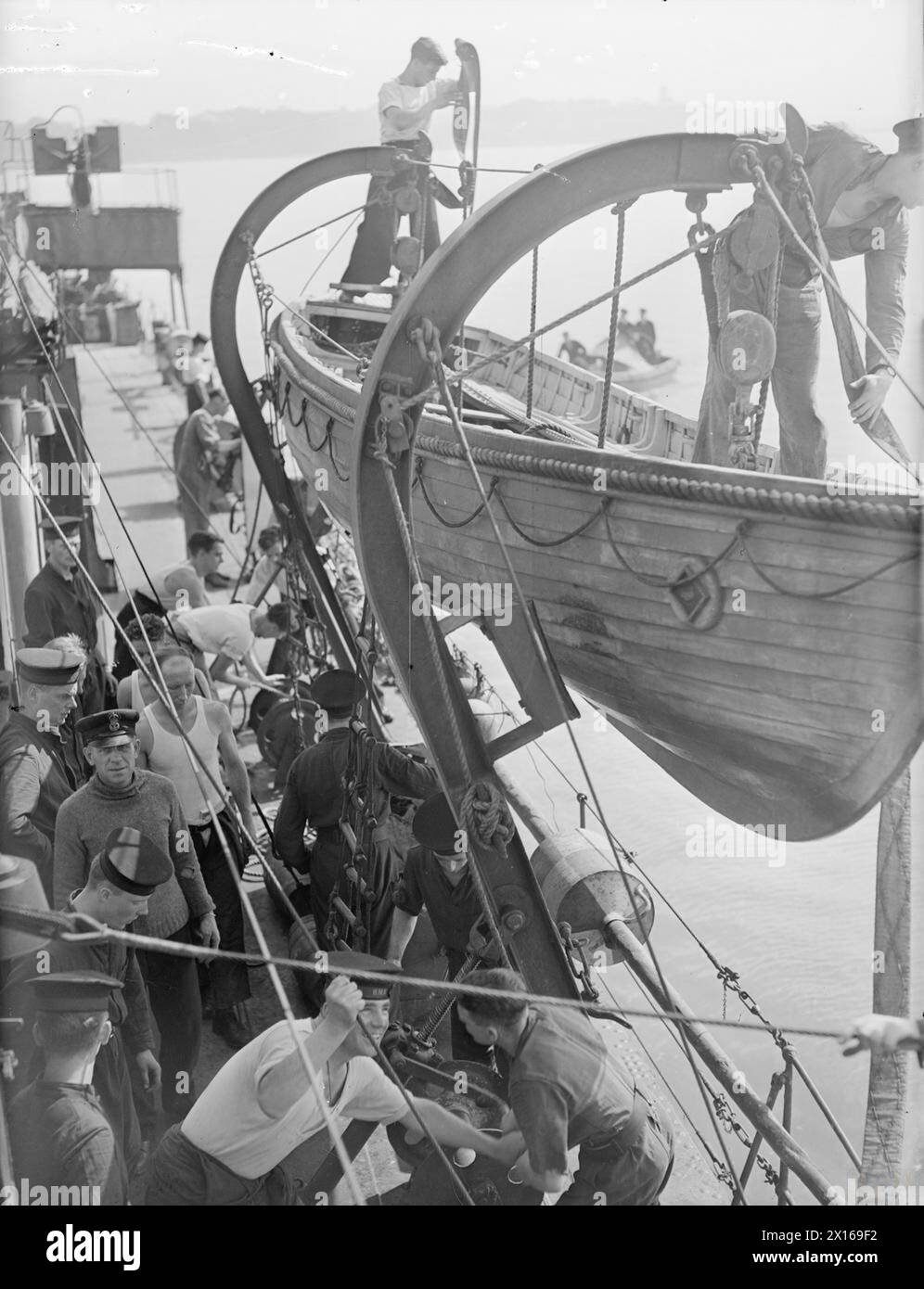 Crew of the British corvette Widgeon securing a sea-boat while on ...