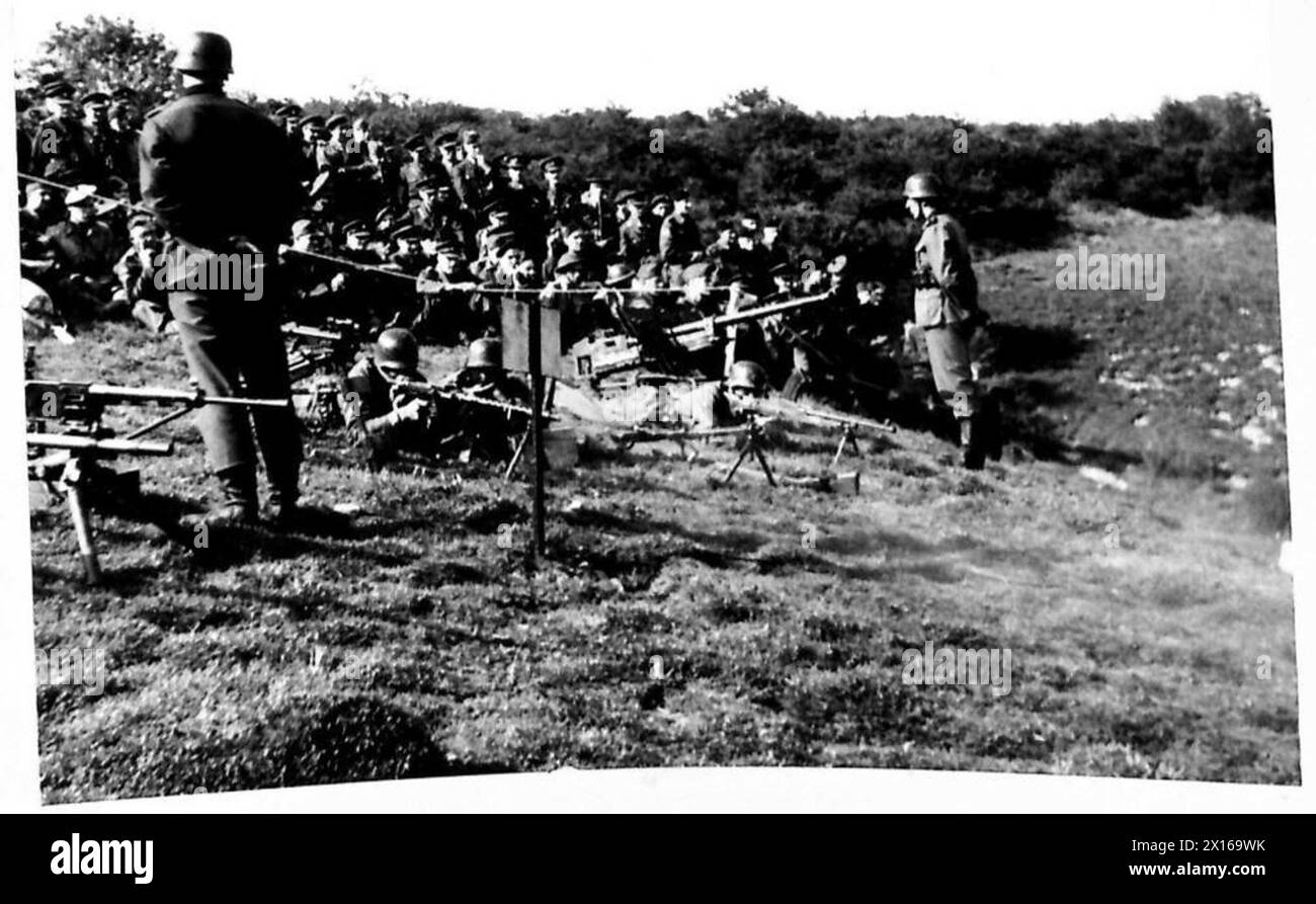 A German MG 34 machine gun is demonstrated firing, showing its ...