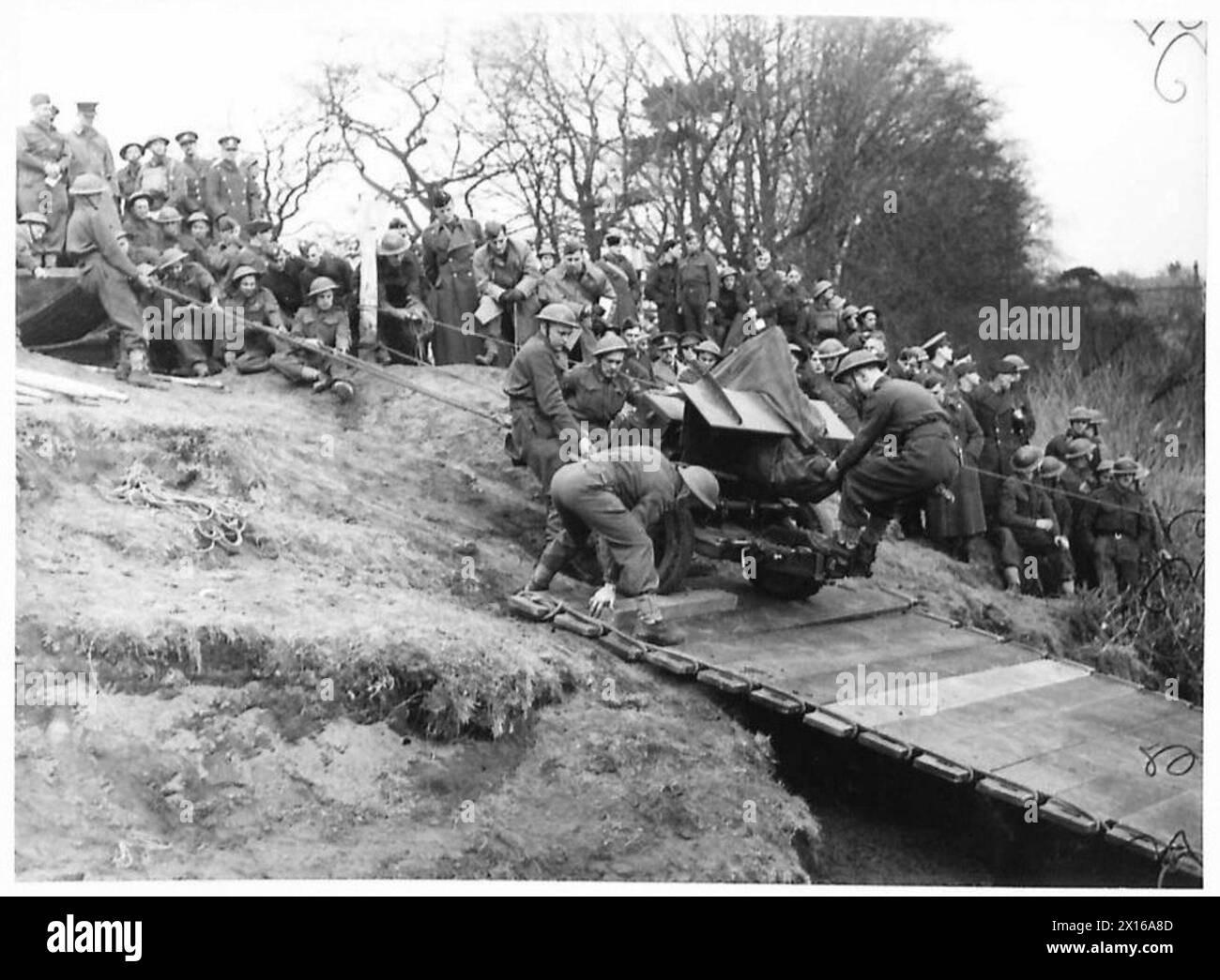 R.E.DEMONSTRATION IN NORTHERN COMMAND - Lowering a two pounder anti ...