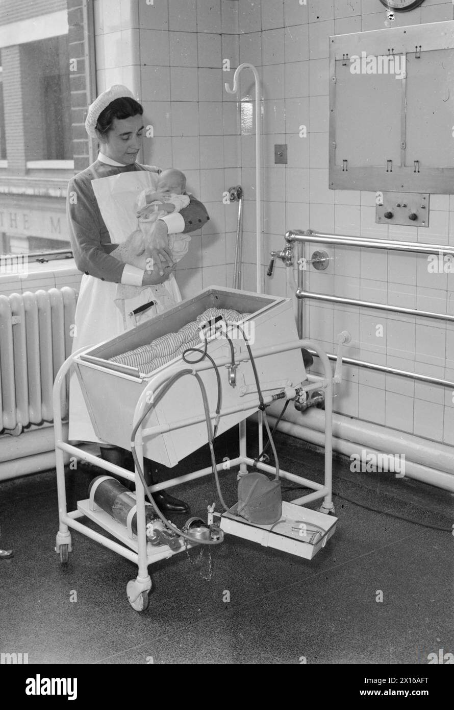 BABY'S LIFE SAVING COT DESIGNED BY NURSE AT MIDDLESEX HOSPITAL, LONDON ...