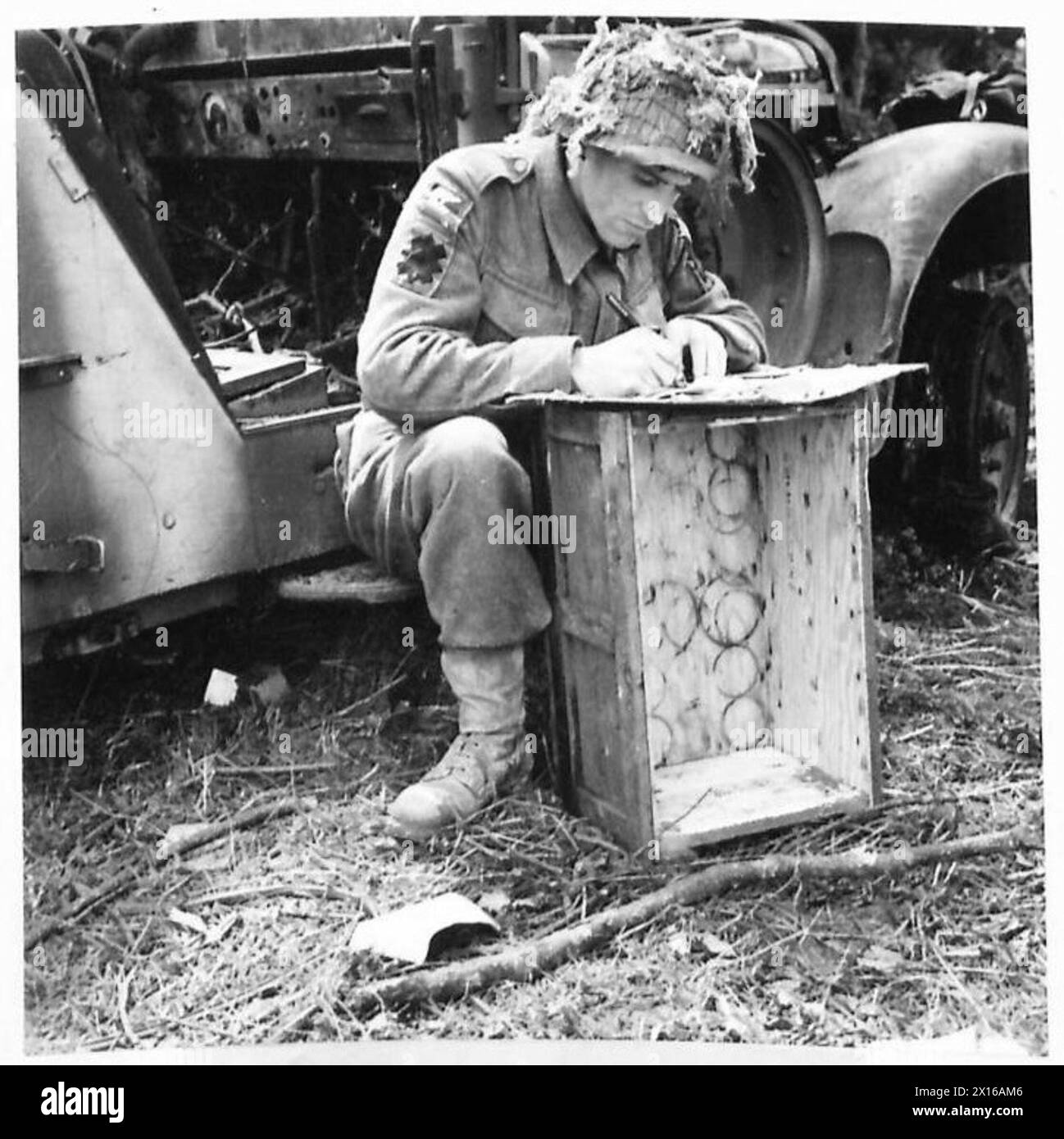 THE BRITISH ARMY IN NORTH-WEST EUROPE 1944-1945 - Seated on the remains ...