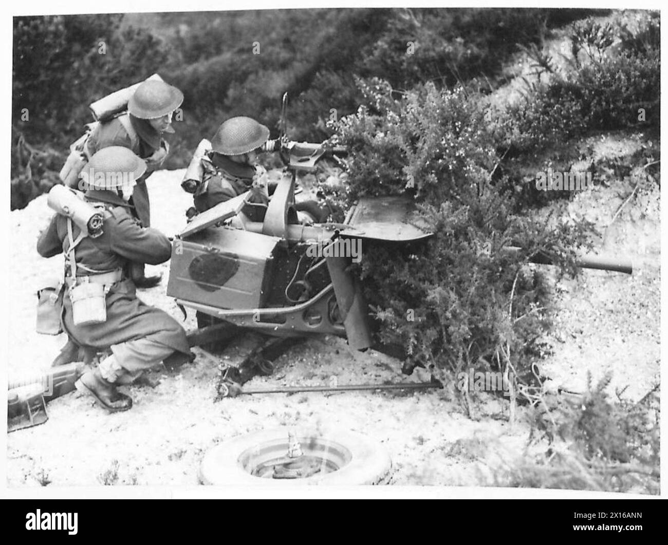 BRITAIN S ARMY TRAINS FOR OFFENSIVE - The anti-tank gun in action after ...