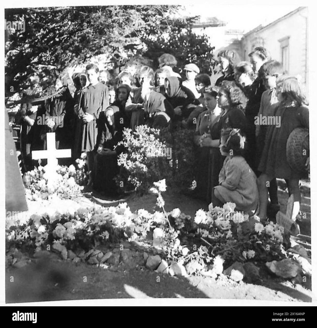 At gravesides, the names J. Rawlings, Cpl. S. Fitzsimmons, and J ...