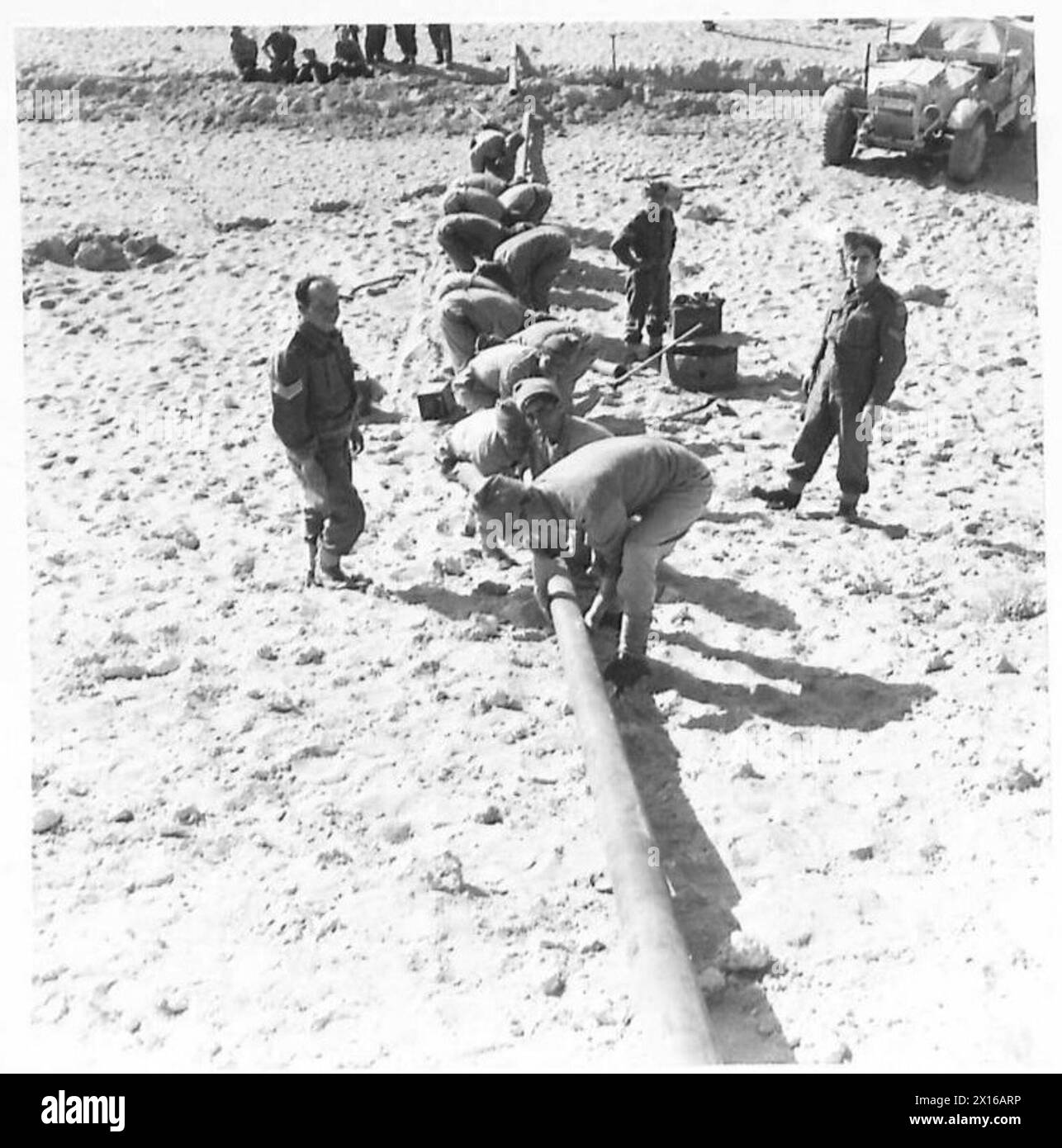 CYPRIOT COMPANY AT WORK IN THE WESTERN DESERT - A water pipeline being ...