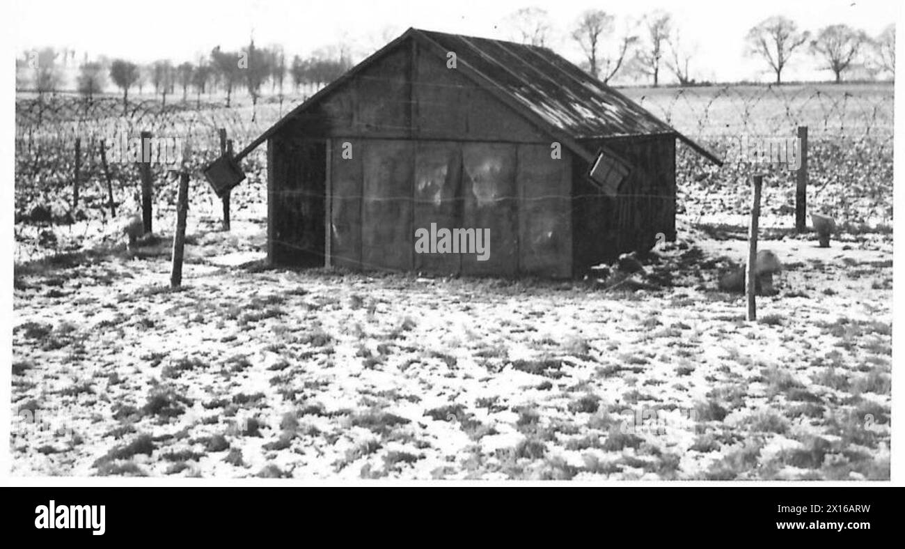 CAMOUFLAGE - A camouflaged machine gun post. The roof is fitted with ...