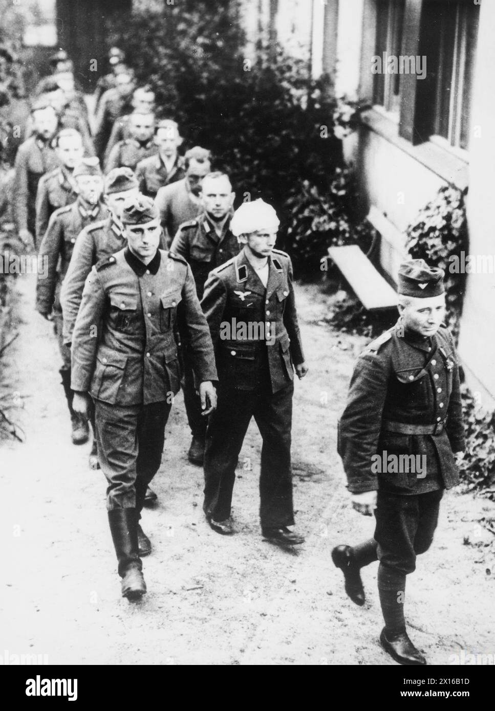 German POWs captured during the siege of Warsaw are marched into ...