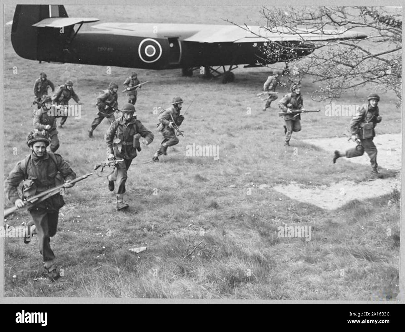 PARATROOPS LAND FROM R.A.F. GLIDERS - 12964 Picture (issued 1944) shows ...