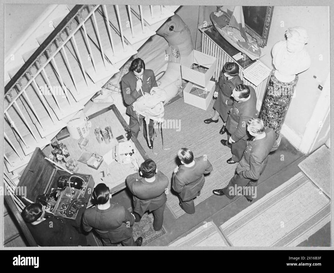 Aircrew receive a pre-flight briefing at Bowood House, R.A.F. Station ...
