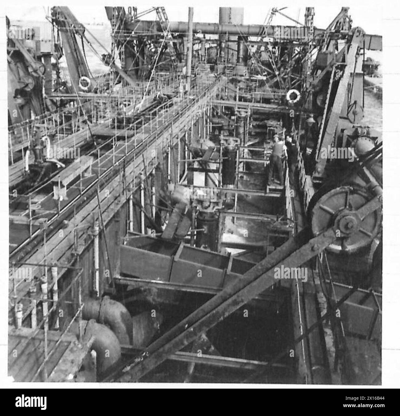 PHOTOGRAPHS OF PREFABRICATED PORT, ETC. - View of dredger modified for ...