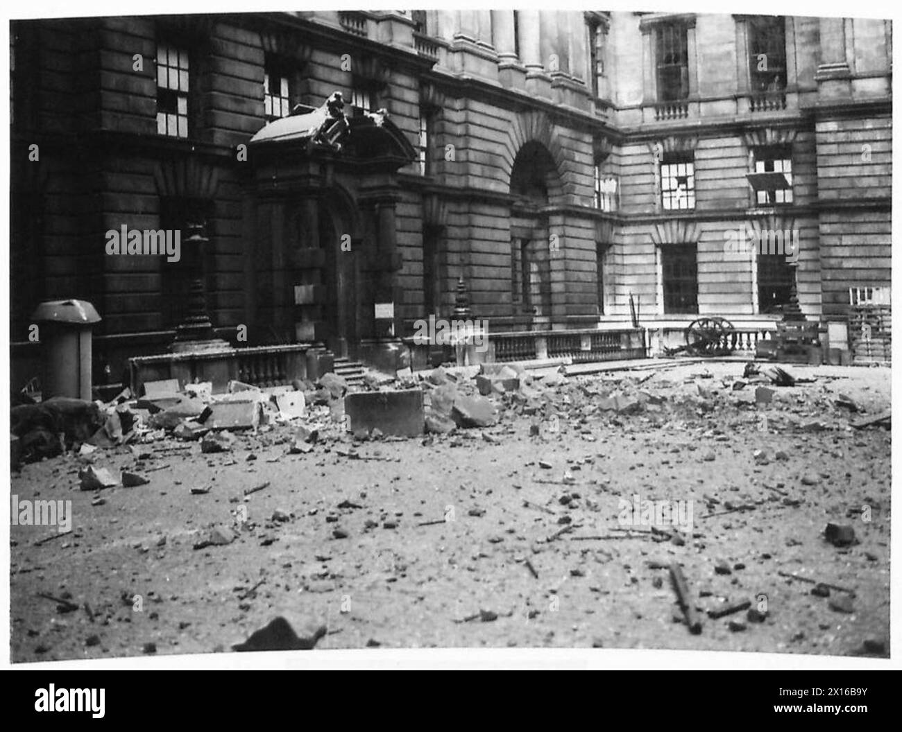 BOMB DAMAGE - Broken masonry and broken windows in the War Office ...