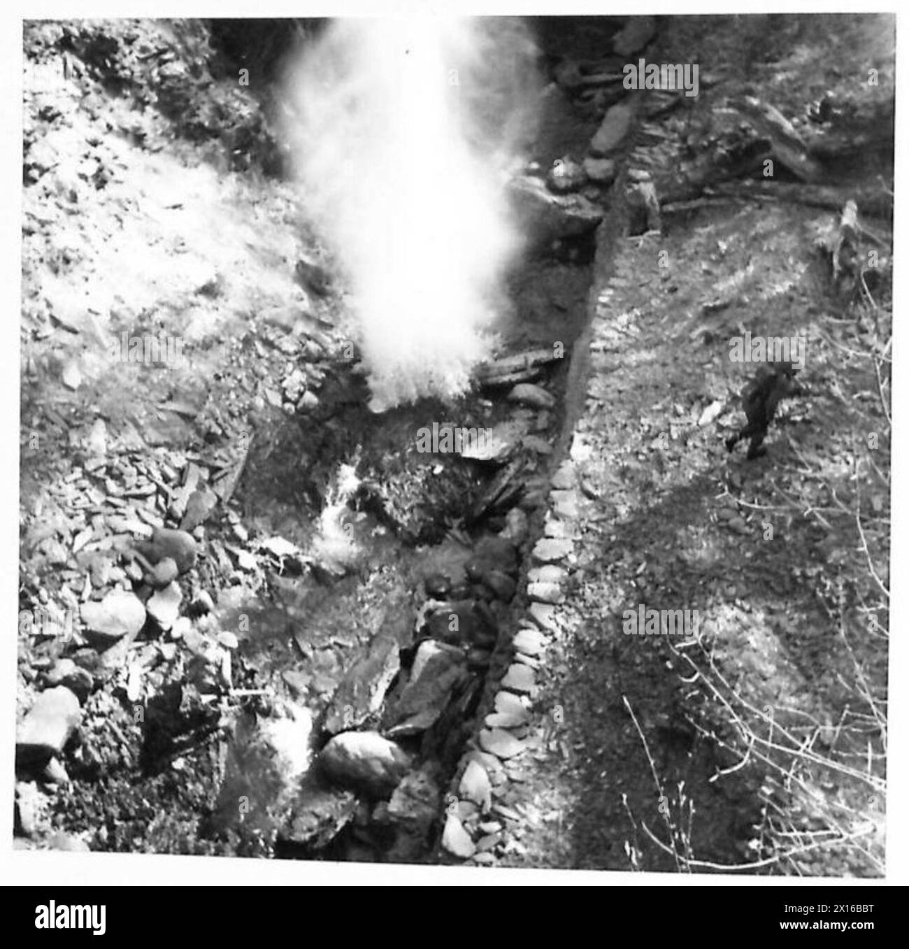 Soldiers cross streams during a Battle School exercise as part of ...