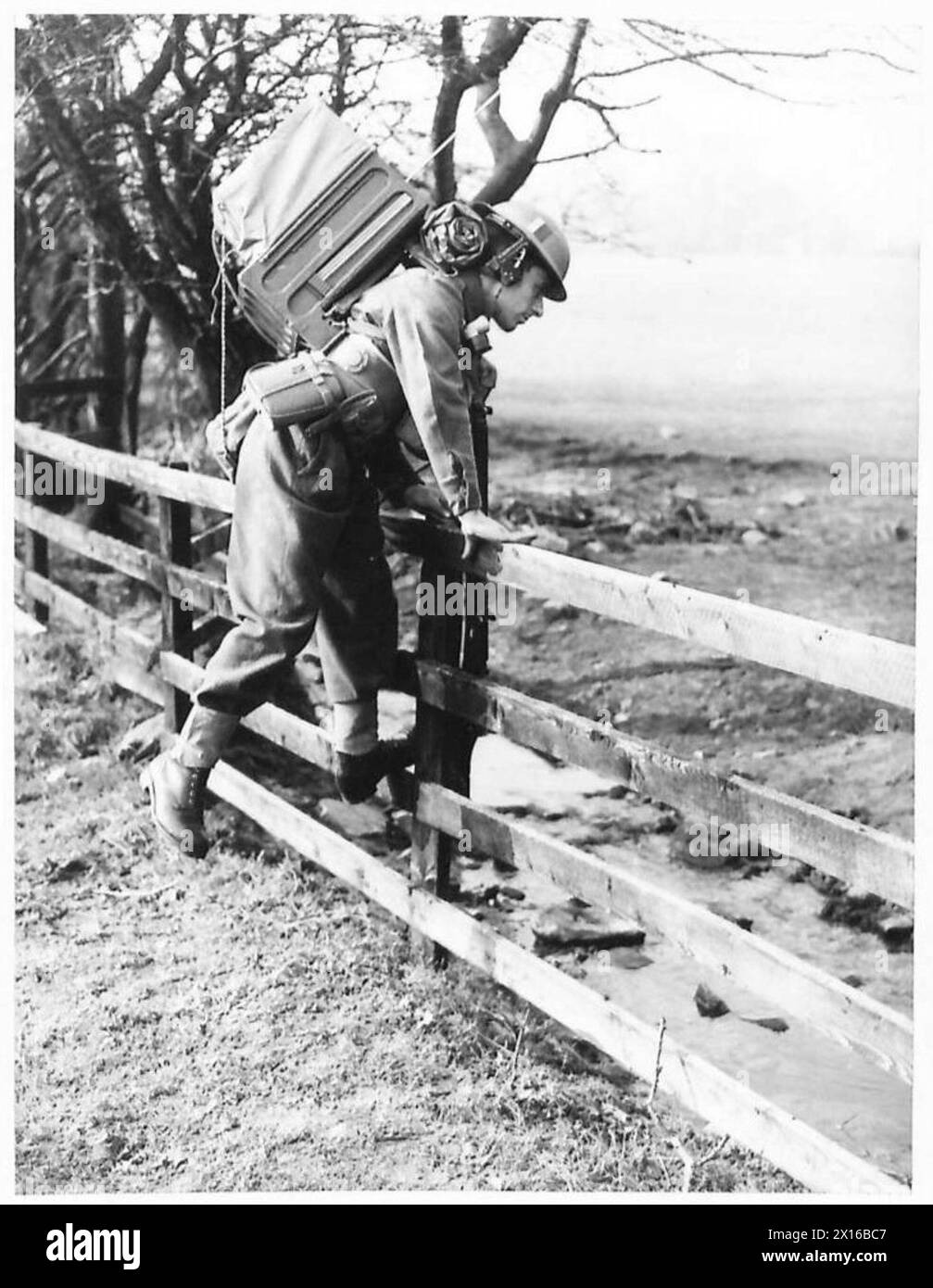 An infantryman carries a wireless set as part of communications ...
