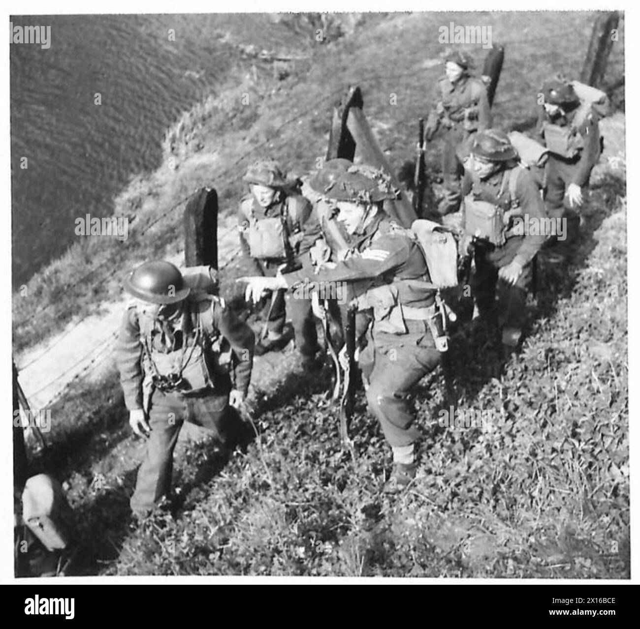 A REALISTIC EXERCISE - A section leader giving instructions to his unit ...