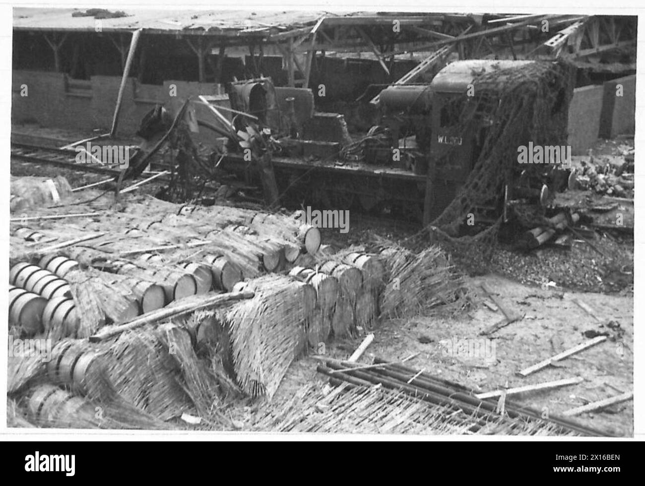 A railway locomotive is damaged during a raid on a captured German oil ...