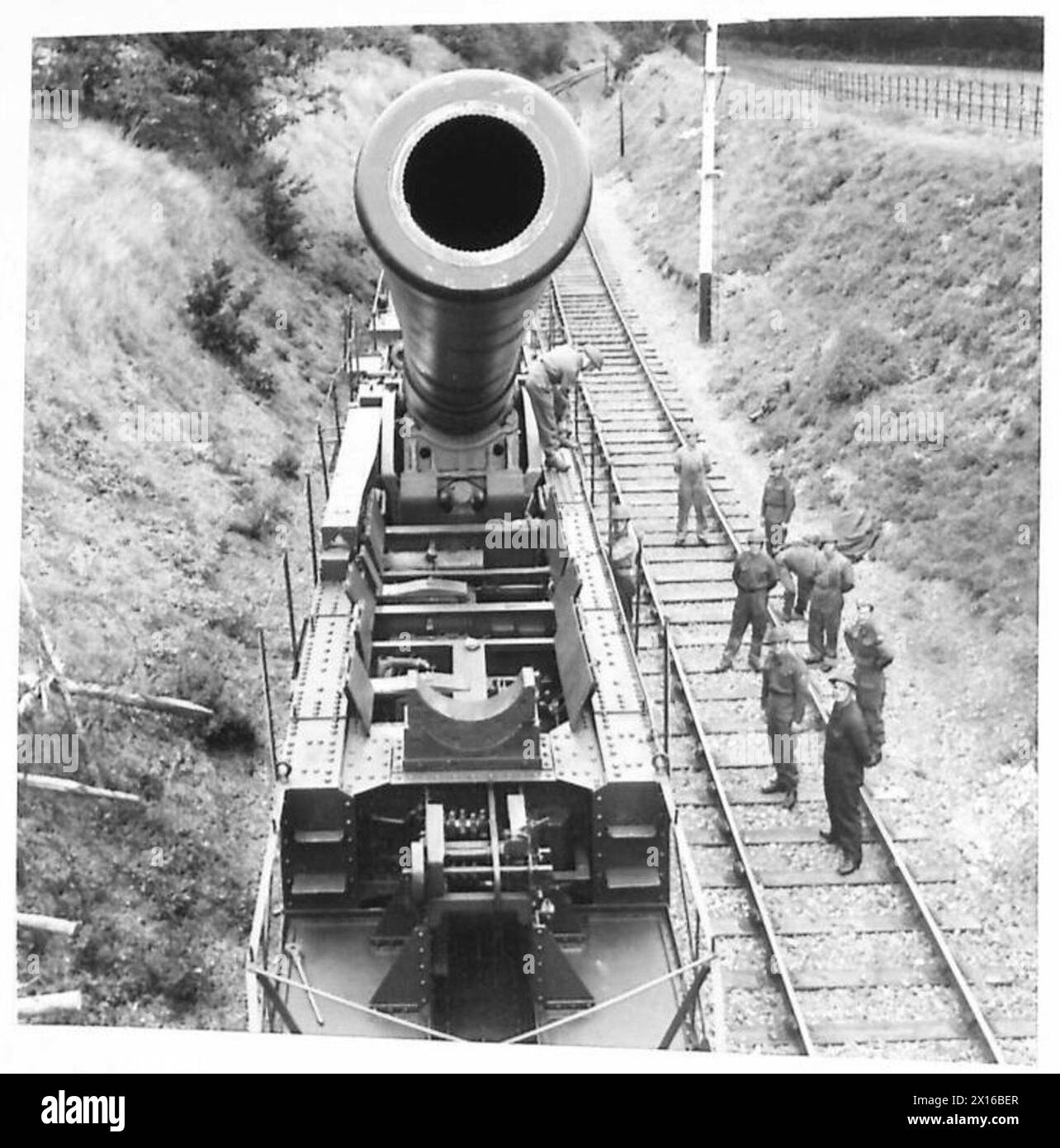 The H.M.G. Boche Buster is mounted on its railway platform ...