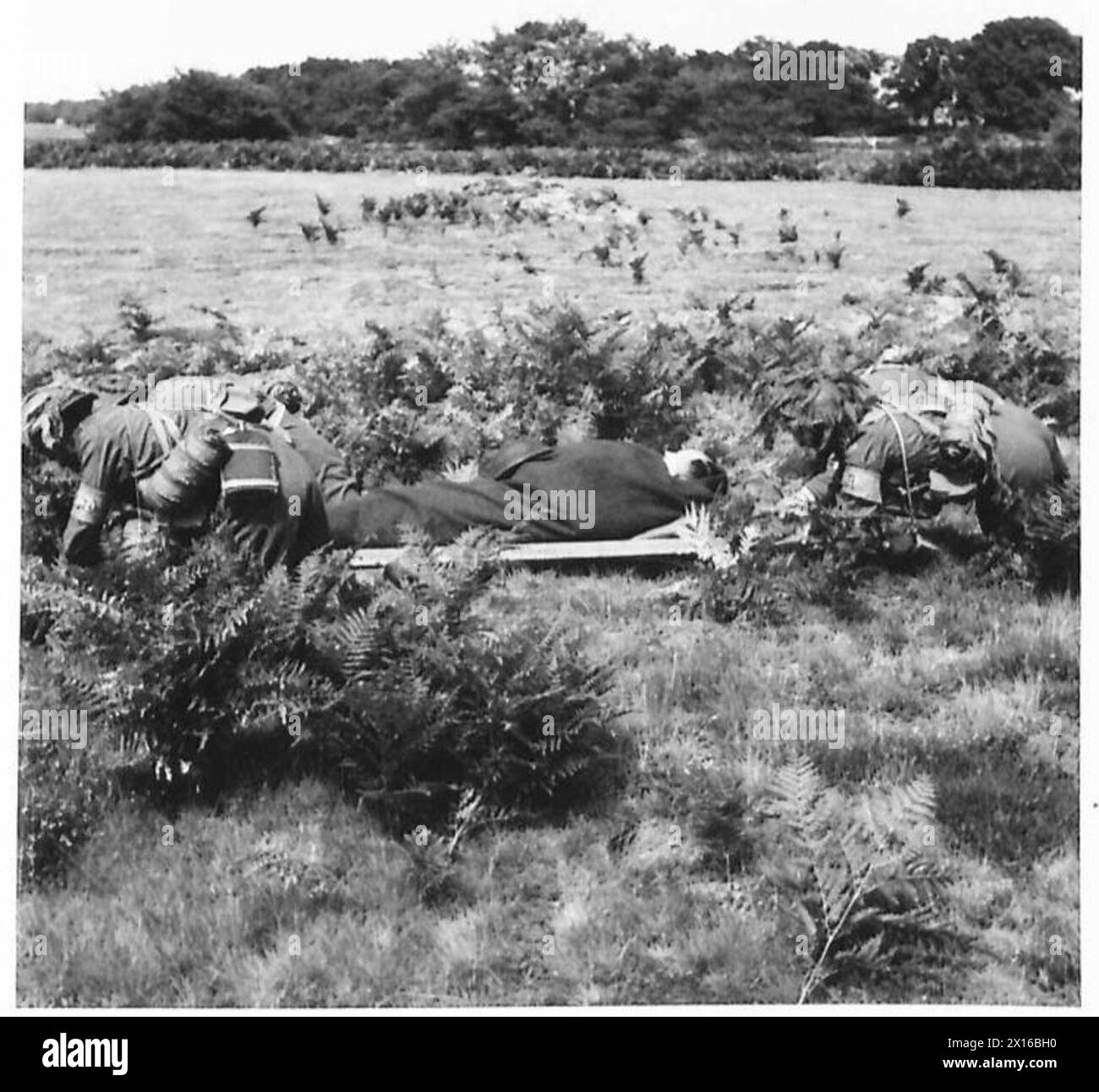 HOME GUARD STRETCHER BEARER COMPETITION - A stretcher party crawling ...