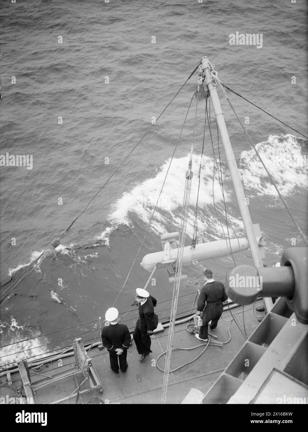 ON BOARD THE CRUISER HMS SHEFFIELD DURING AN ATTACK ON A BRITISH CONVOY WHICH WAS ESCORTED BY ...