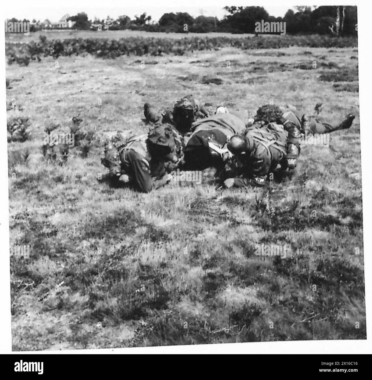 HOME GUARD STRETCHER BEARER COMPETITION - A stretcher party crawling ...