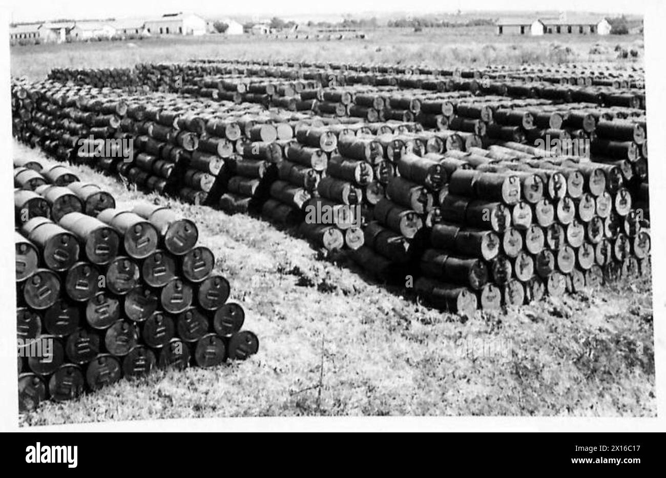 PETROL DEPOT - Drums of lubricating oil, belly stacked British Army ...