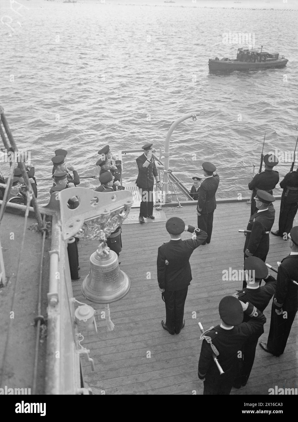 THE KING VISITS THE HOME FLEET. 6 JUNE 1942, ON BOARD HMS LONDON, AT ...