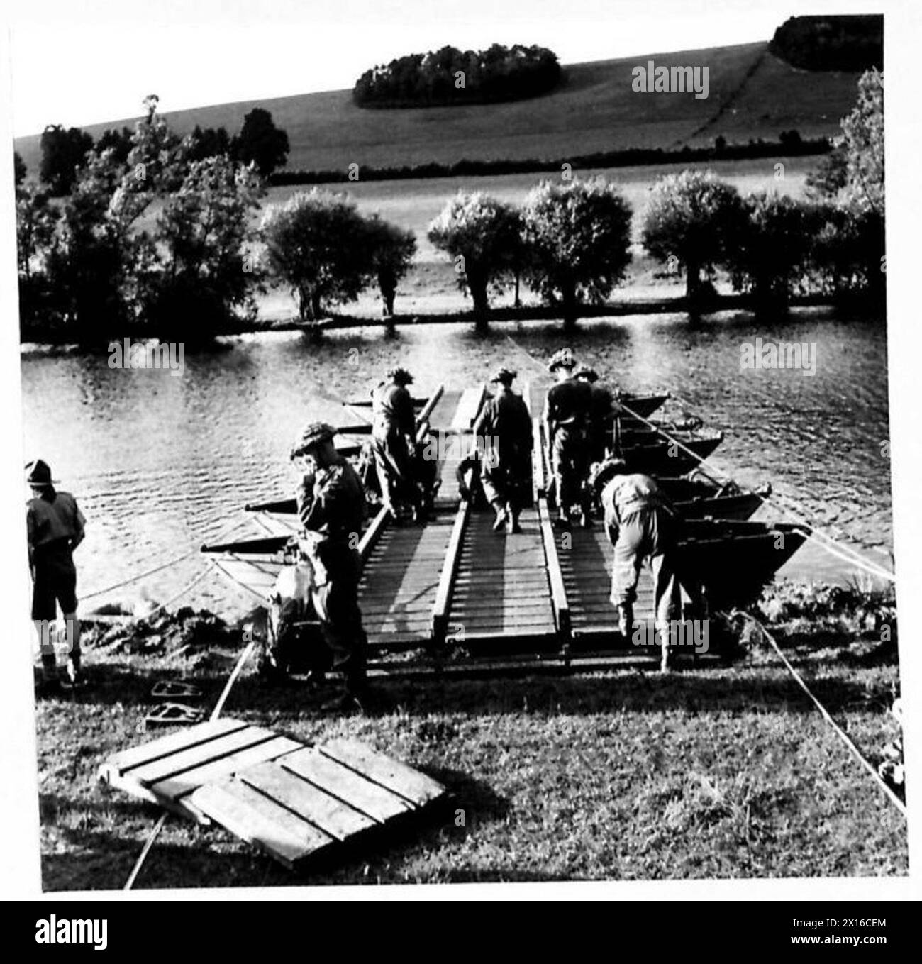 Instructional photographs depict bridging operations showing multiple ...