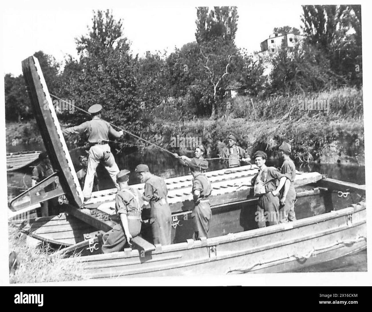 ROYAL ENGINEERS PONTOON BRIDGE BUILDING - One section being placed in ...
