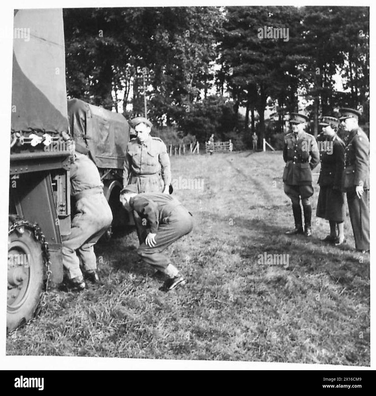 H.R.H. the Princess Royal and Brigadier observe a demonstration by a ...