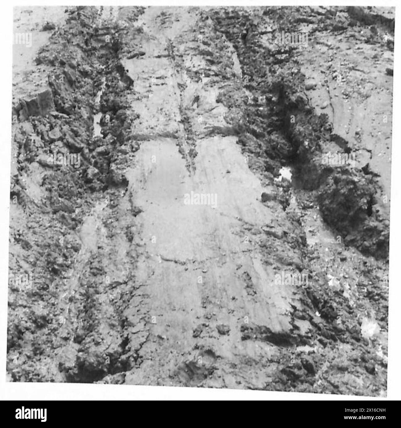 EXPERIMENTS IN TANK RECOVERY - Deep holes left in the mud after the ...