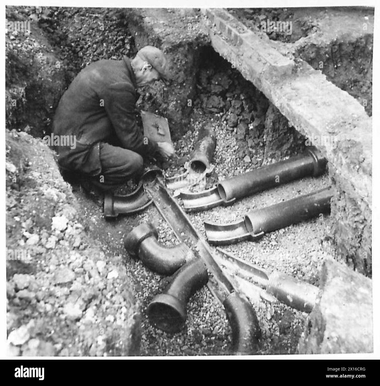 ANOTHER NEW ARMY CAMP - At work on drainage for sanitary and ablution ...