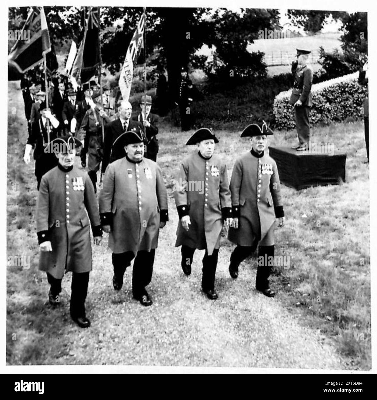 Four Chelsea pensioners participate in a parade at Bushey Heath ...