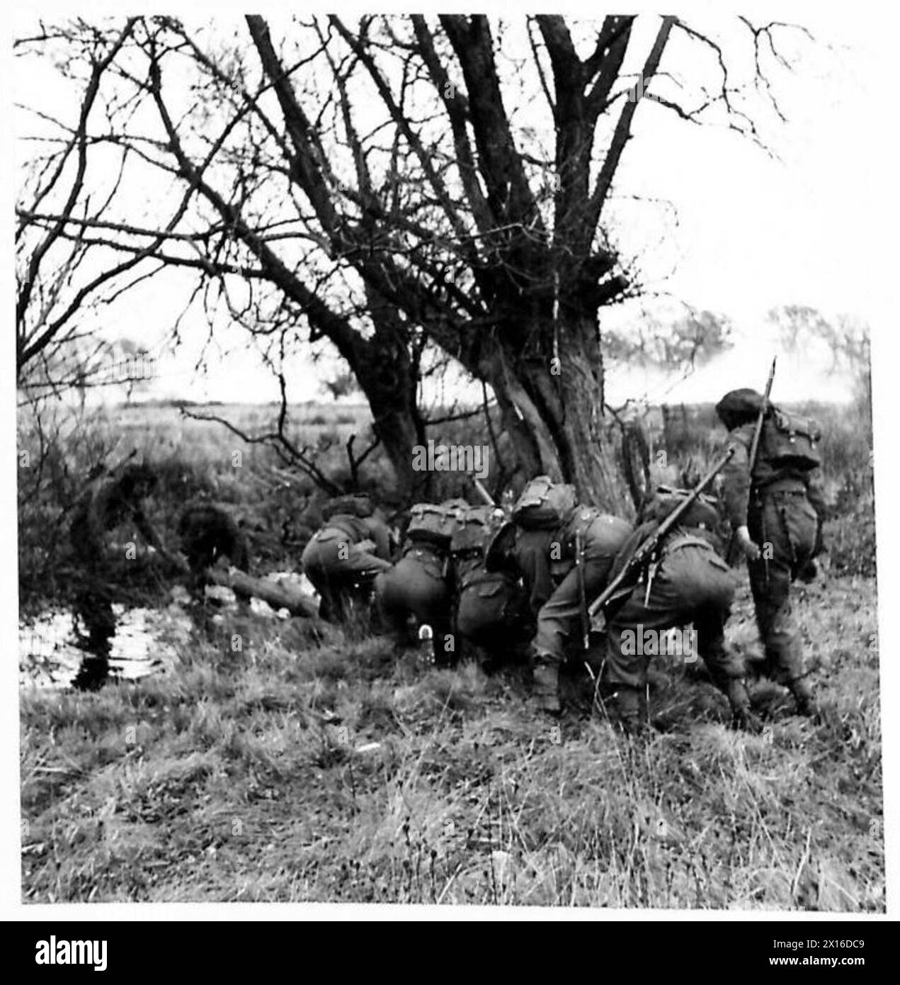 Young soldiers practice modern warfare tactics by advancing through ...